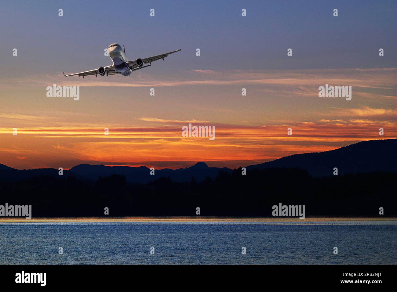 Jet plane, aircraft and colorful west coast sunset BC, Canada Stock ...