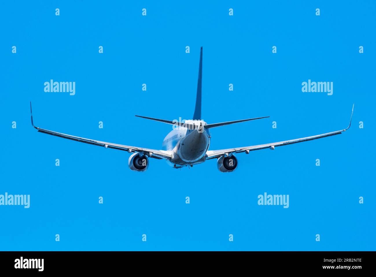 Sharp telephoto close-up of aircraft taking off from Victoria, BC ...