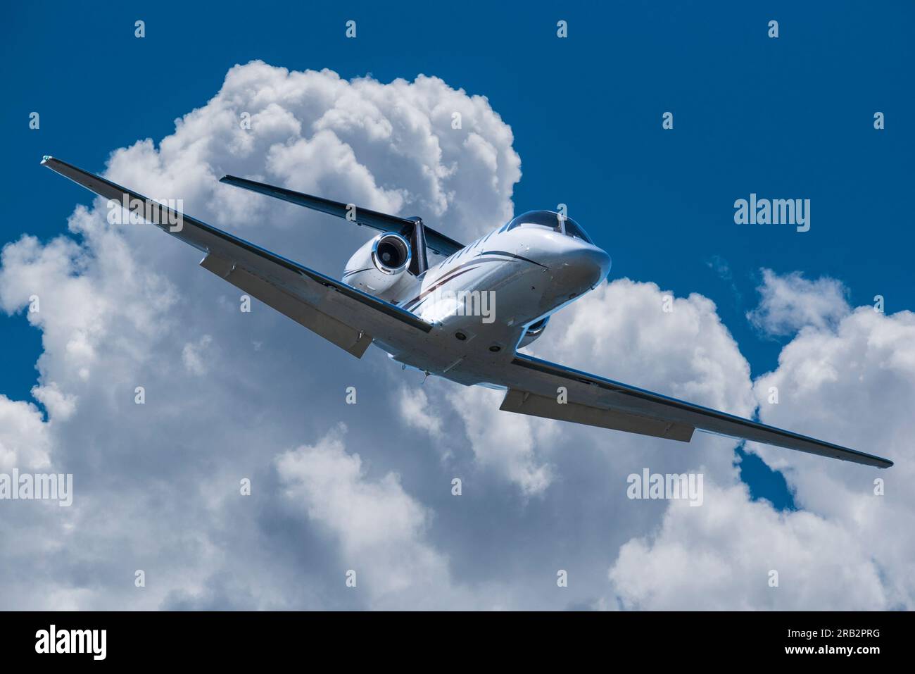 Sharp, close-up telephoto of a private jet aircraft in flight, Victoria ...