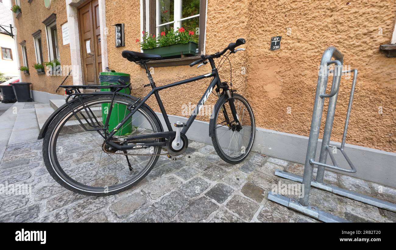 A bicycle on sidewalk of Hallstatt town, Salzkammergut, Austria - June ...