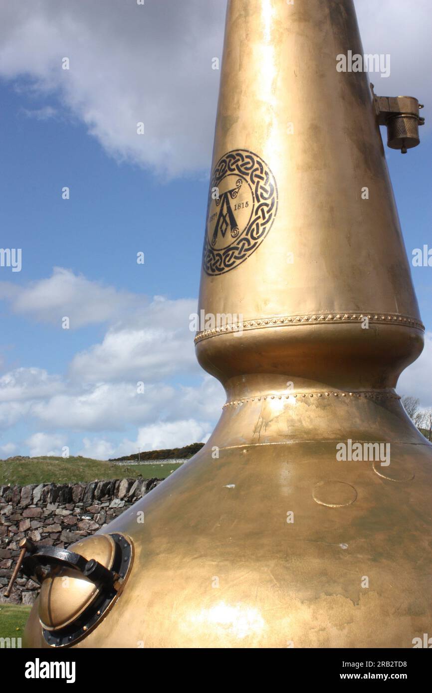 An old still in the car park of the Ardbeg Distillery on Islay ...