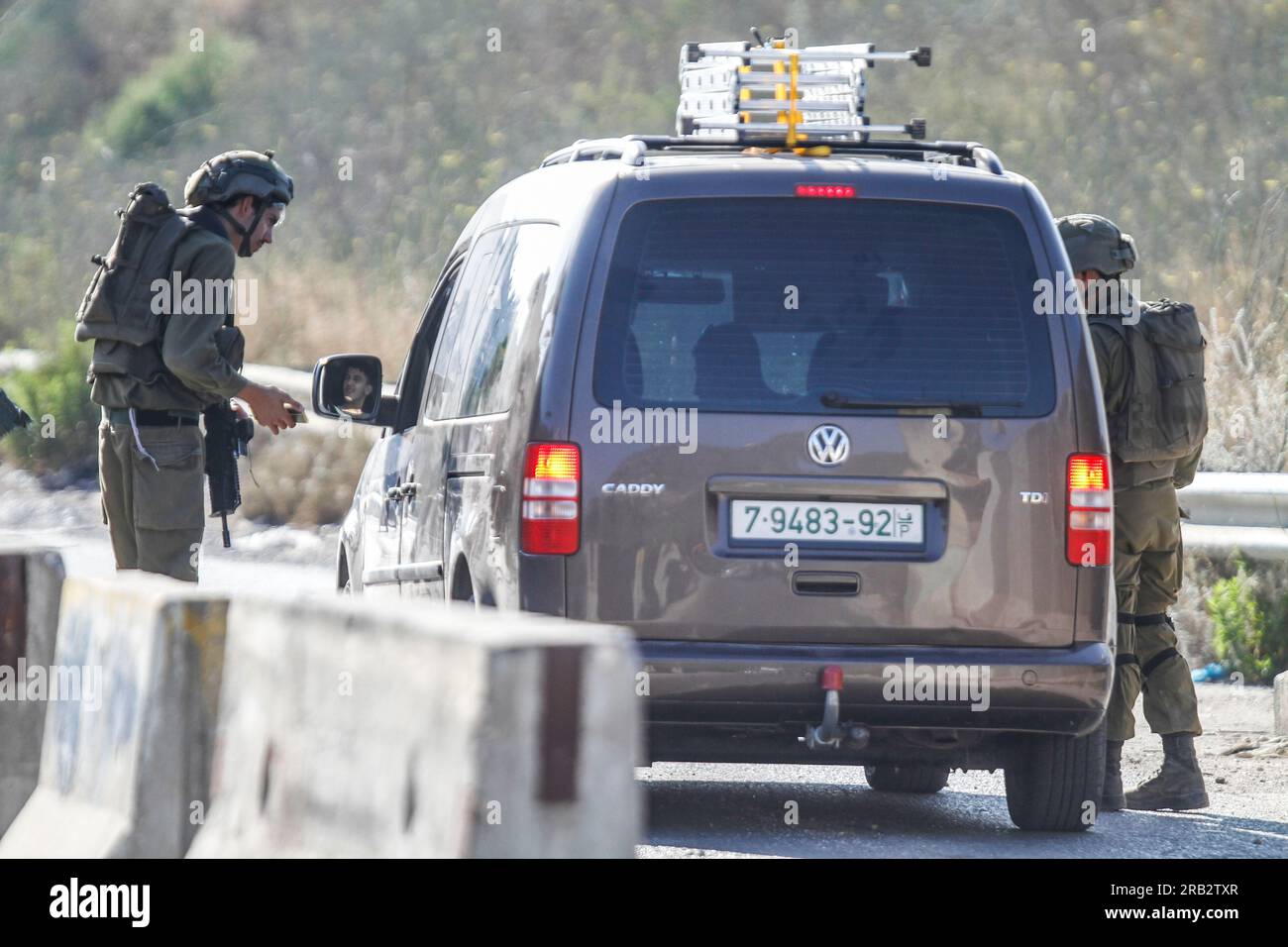 Nablus, Palestine. 06th July, 2023. Israeli soldiers search Palestinian ...