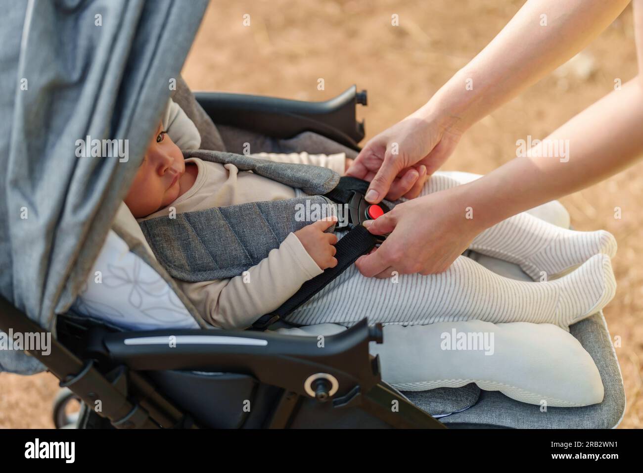 Chinese woman carrying baby on hi-res stock photography and images - Alamy