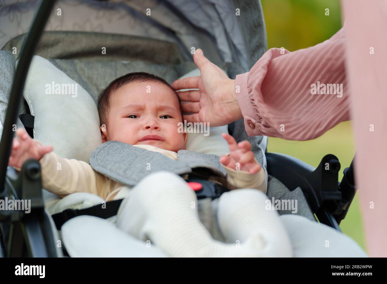 Sad mother baby stroller hi-res stock photography and images - Alamy