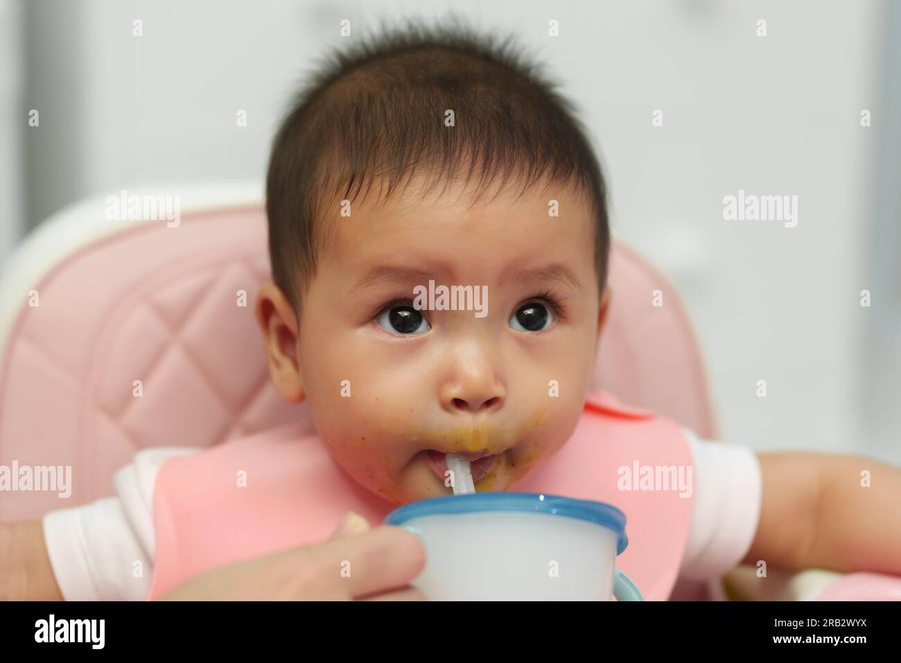 Infant water cup hi-res stock photography and images - Alamy
