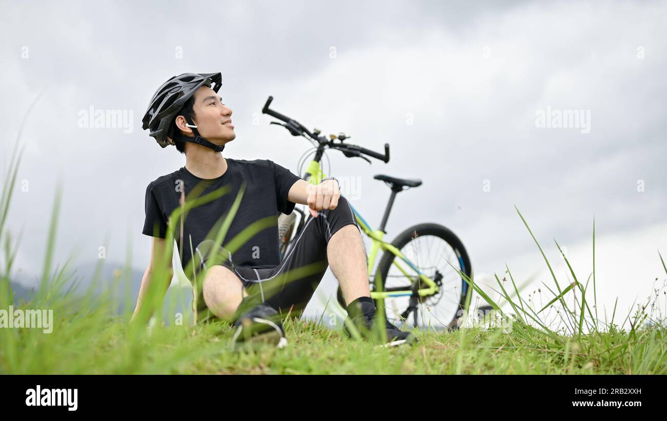 Male biker taking break in hi-res stock photography and images - Alamy