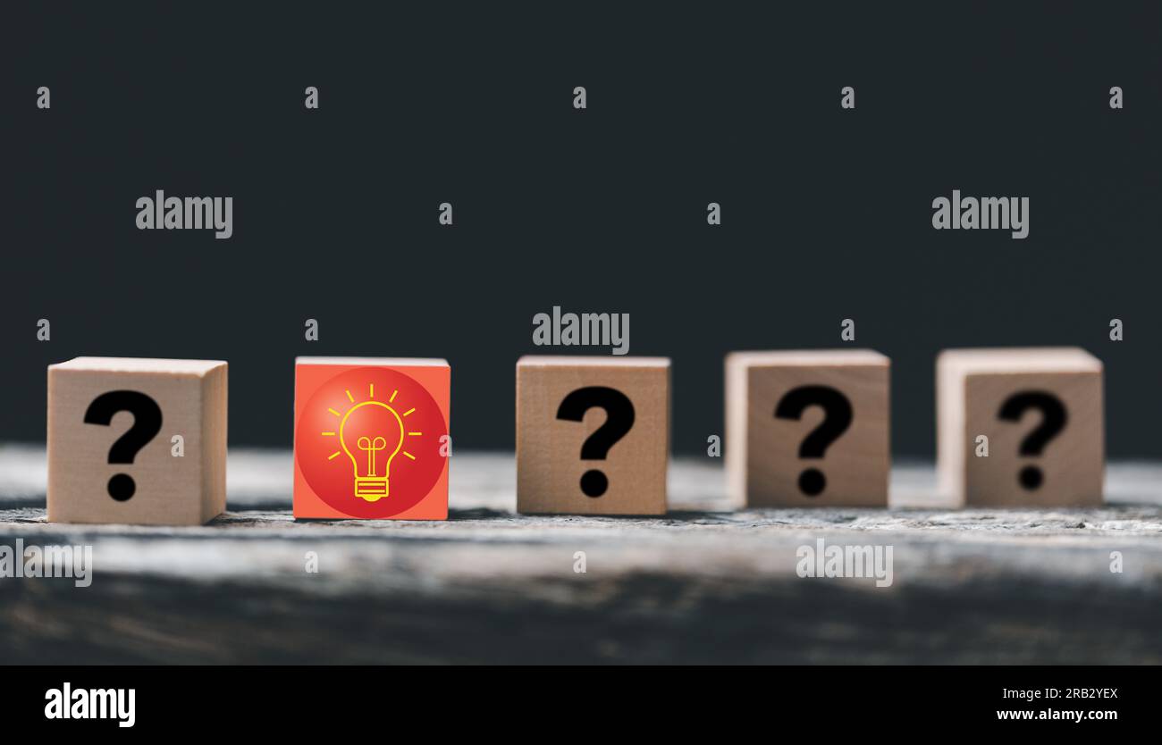 Knowledge and education concept. Concept creative idea and innovation. Hand choose wooden cube ...