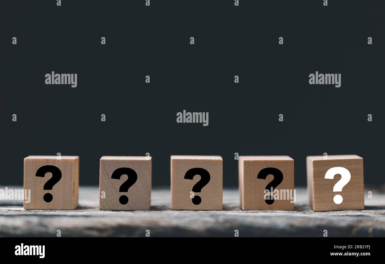 Knowledge and education concept. Concept creative idea and innovation. Hand choose wooden cube ...