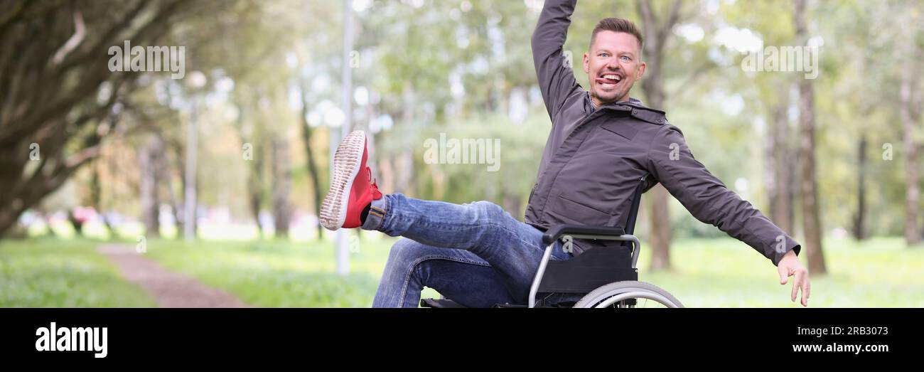 Funny smiling disabled man playing with basketball ball Stock Photo - Alamy