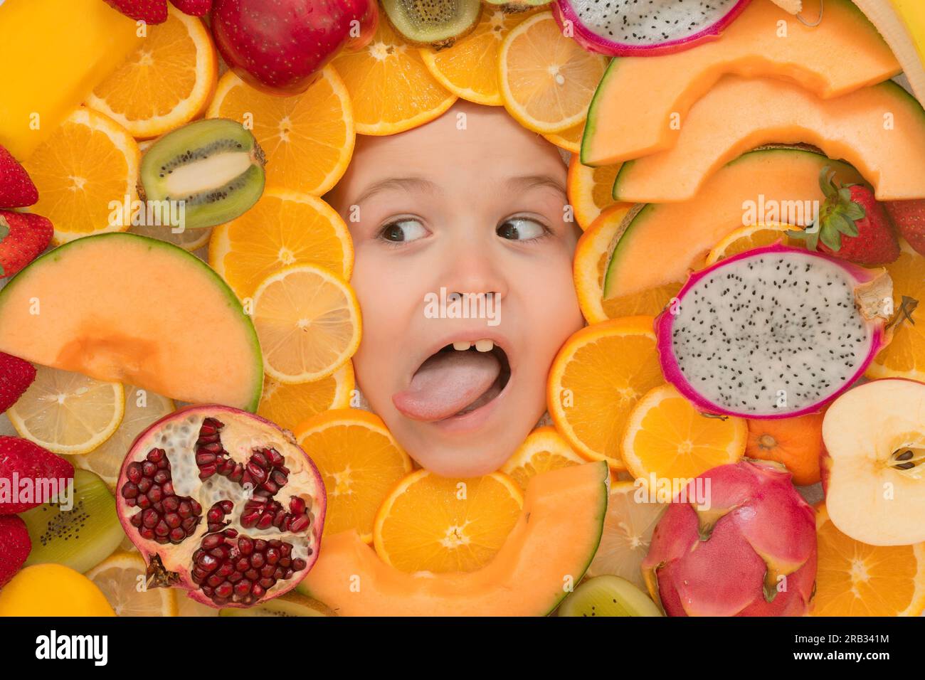 Healthy vitamins fruits. Kids face with mix of fresh frutis. Healthy ...