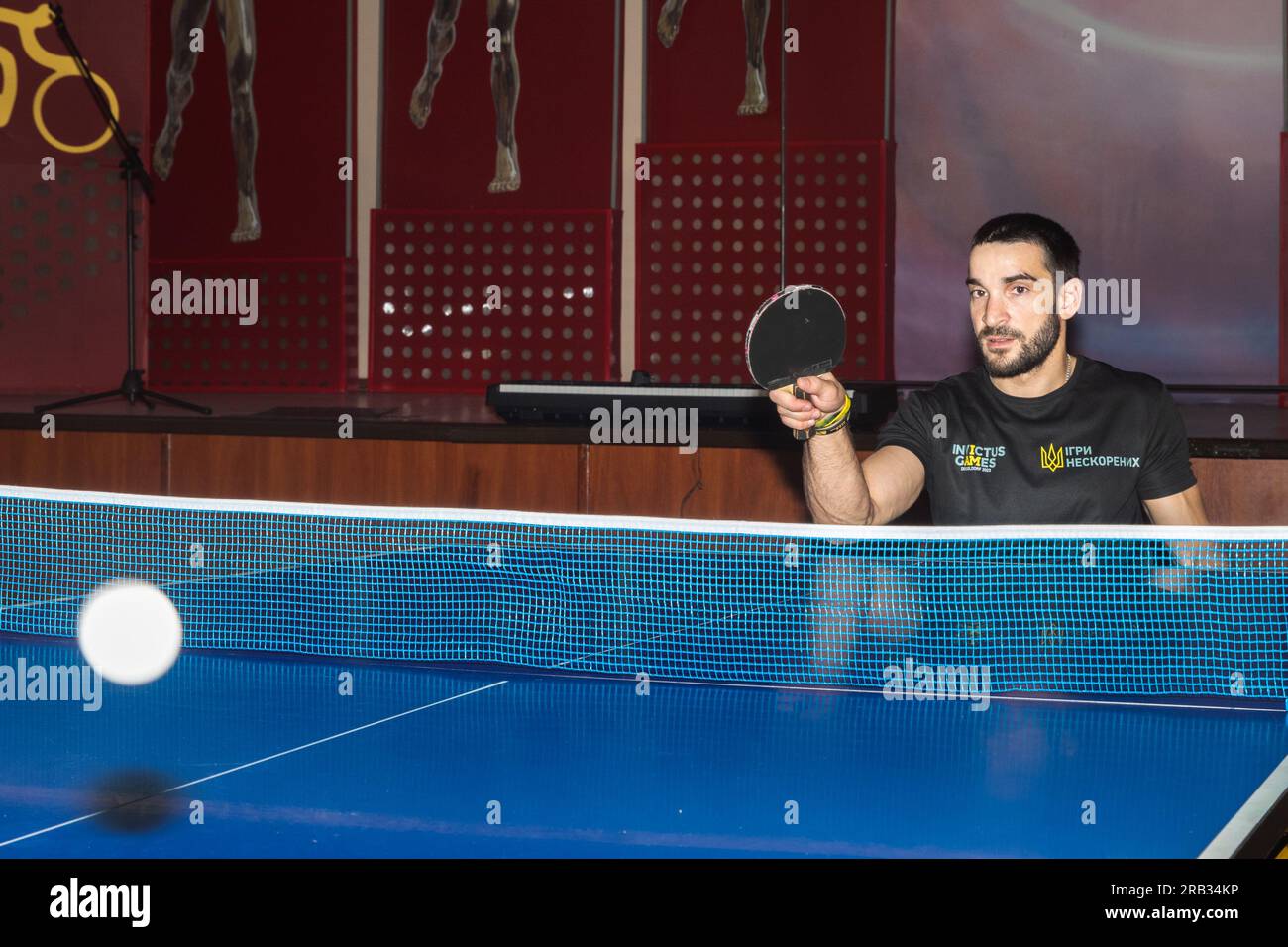 KYIV, UKRAINE - Jul. 05, 2023: A man in a wheelchair is seen playing ...