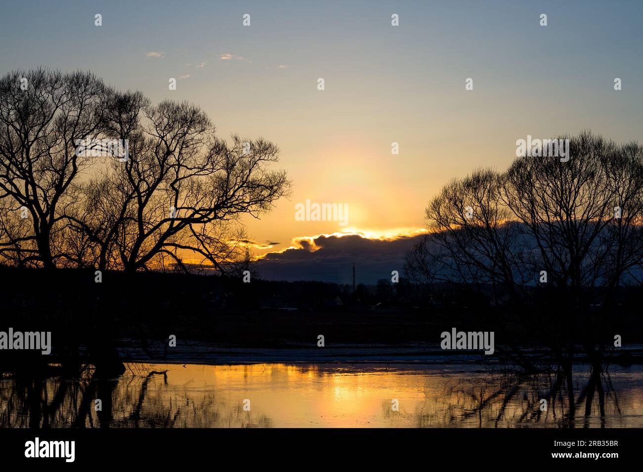 Beautiful sunset with a solar halo effect in atmosphere Stock Photo - Alamy
