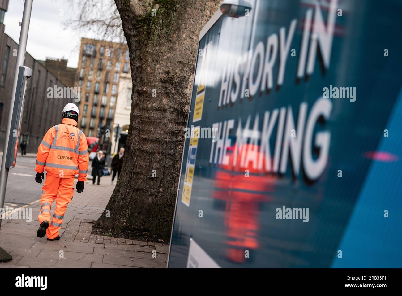 File photo dated 27/01/23 of a construction worker walking past HS2 ...
