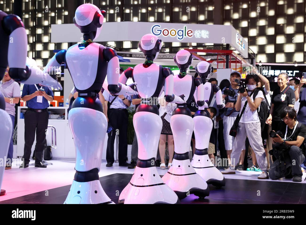 **CHINESE MAINLAND, HONG KONG, MACAU AND TAIWAN OUT** Visitors watch AI ...