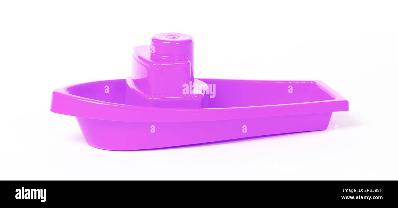 Plastic toy boat isolated on a white background Stock Photo - Alamy