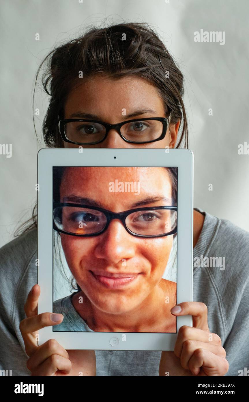 Woman shielding her face hi-res stock photography and images - Alamy