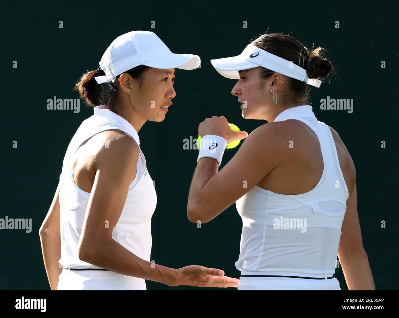 London, Britain. 6th July, 2023. Zhang Shuai (L) of China and Caroline ...