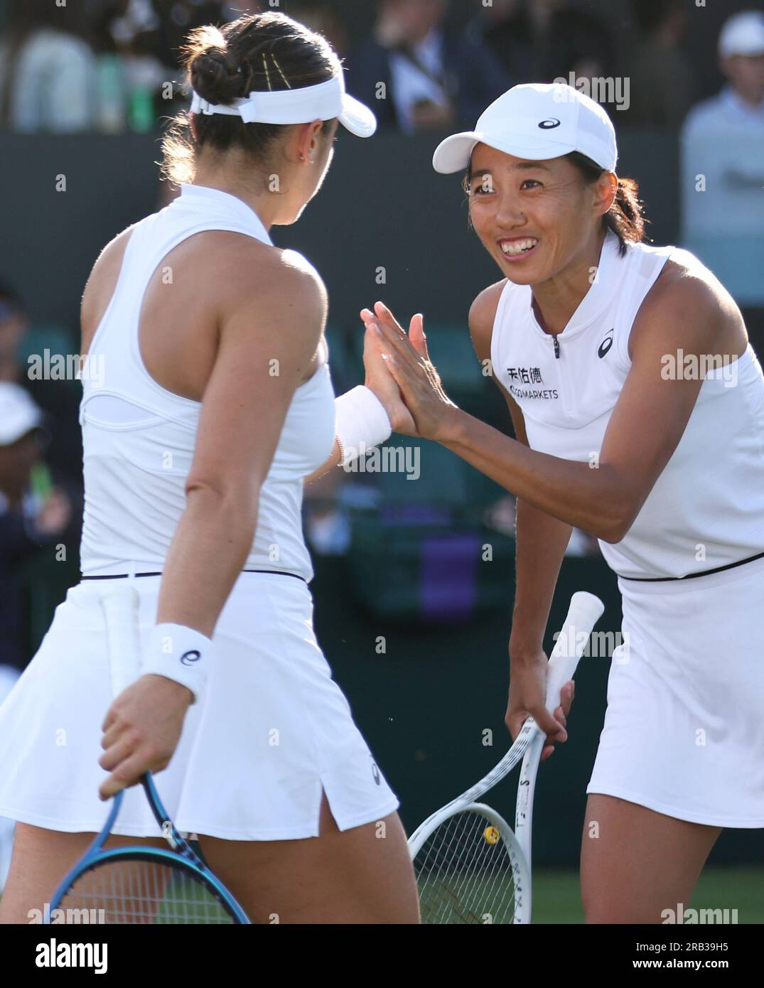 London, Britain. 6th July, 2023. Zhang Shuai(R) of China and Caroline ...