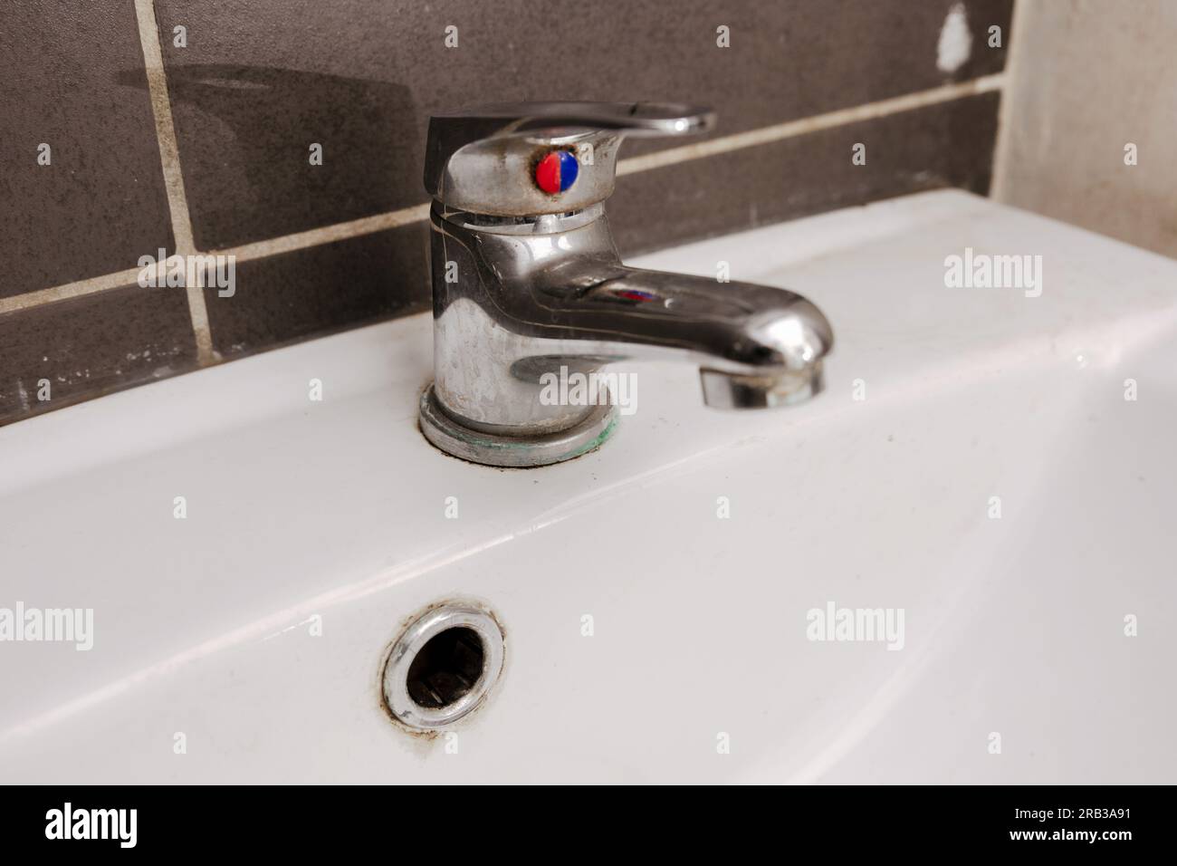 Dirty and rusty washbasin, close up view. Corrosion, unsanitary ...