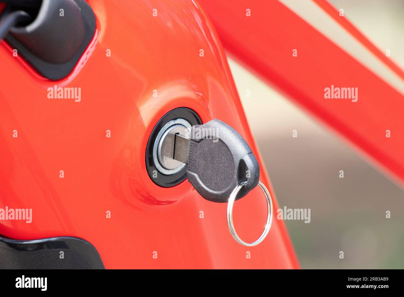 the key is inserted into the keyhole on the frame of the e-bike ...