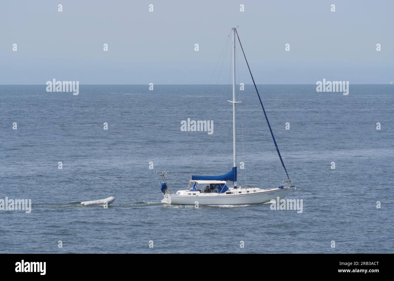 Sailboat in the Pacific Ocean in front of the coast of Lighthouse Park ...