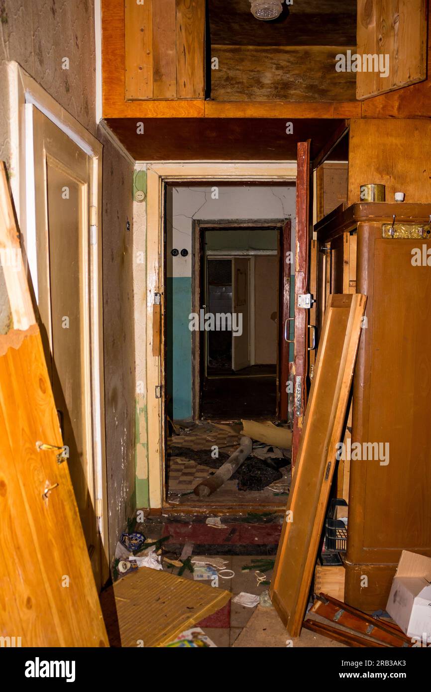 Broken corridor in an apartment of a residential building before ...