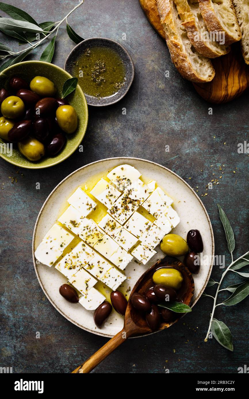 Feta cheese, olives and ciabatta, top view Stock Photo - Alamy