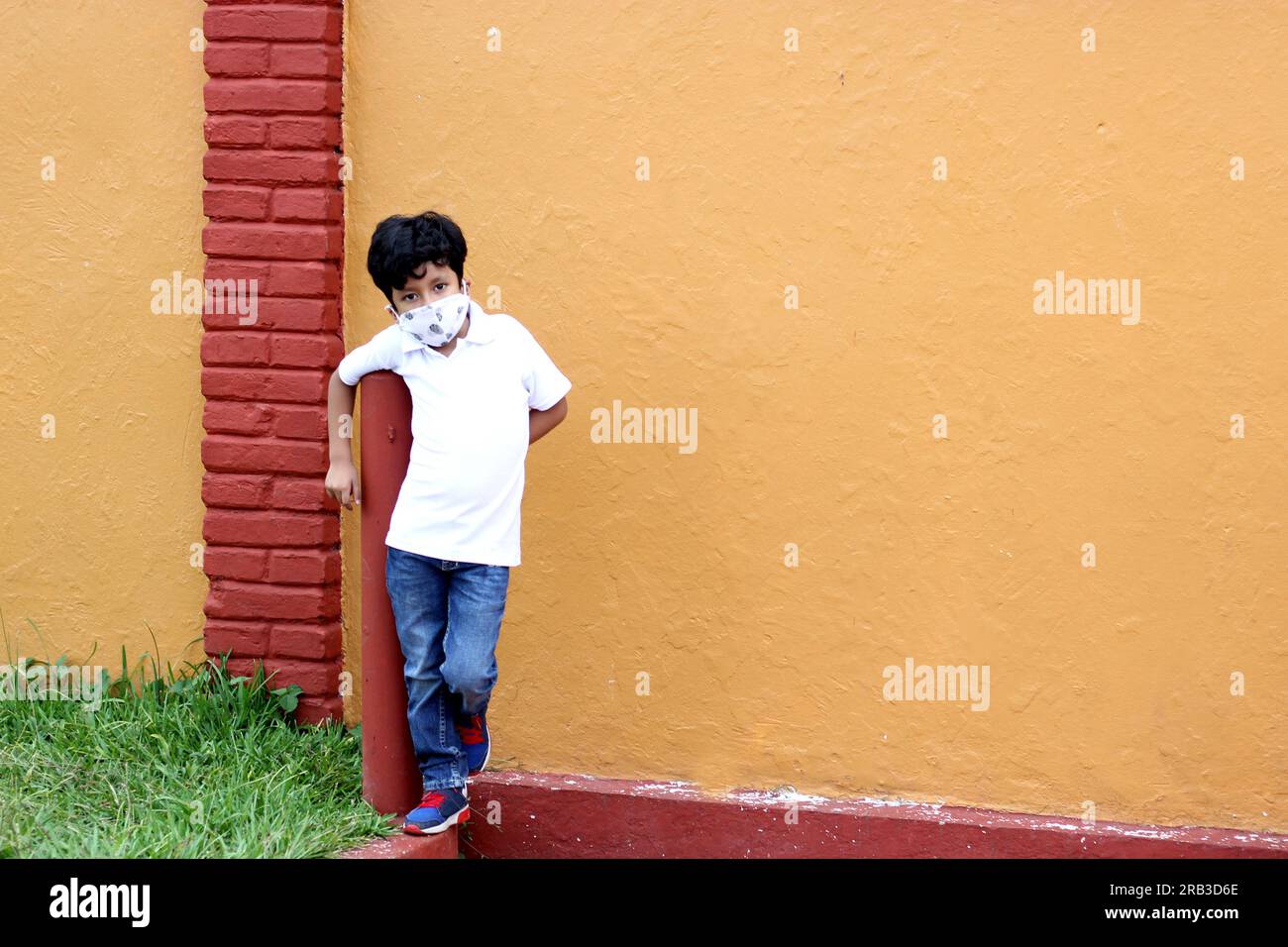 6-year-old Latino boy wearing a face mask for the new normal Stock ...