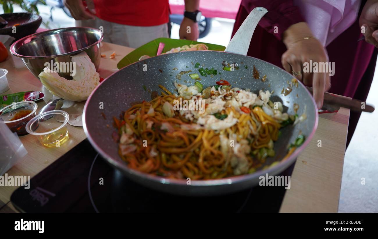 Traditional food cooking competition. fried rice Stock Photo - Alamy