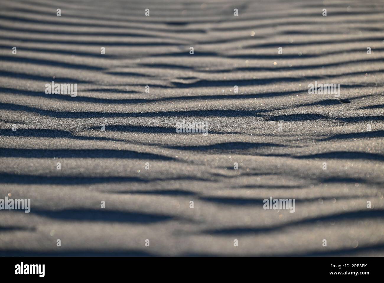 Texture of gray sand in the desert Stock Photo - Alamy