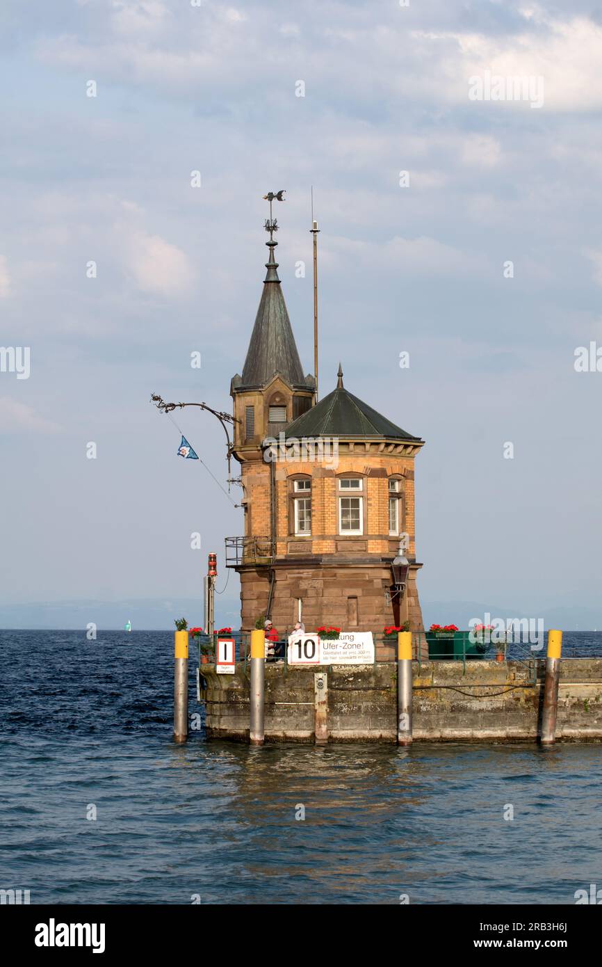 Constance, Germany: lighthouse in the evening light. The Konstanz ...