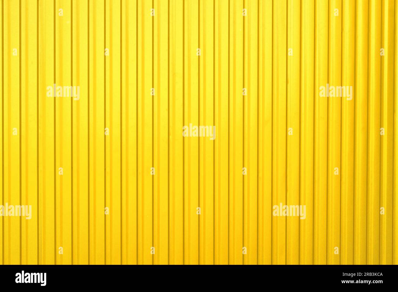 Metal yellow gold sheet profile as a fence, guard, design Stock Photo ...