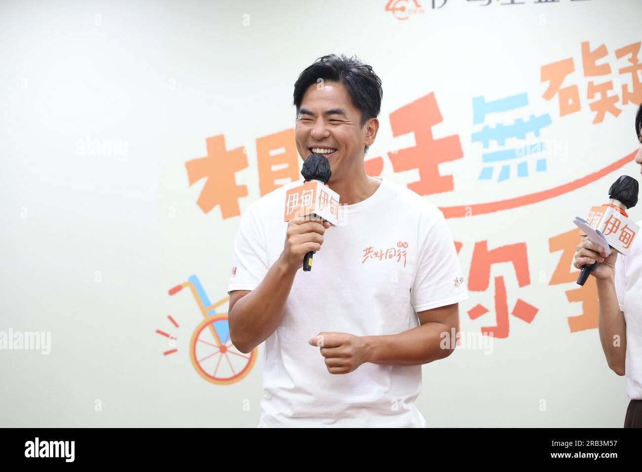 Taiwanese singer and actor Alan Ko attends a public benefit activity in ...