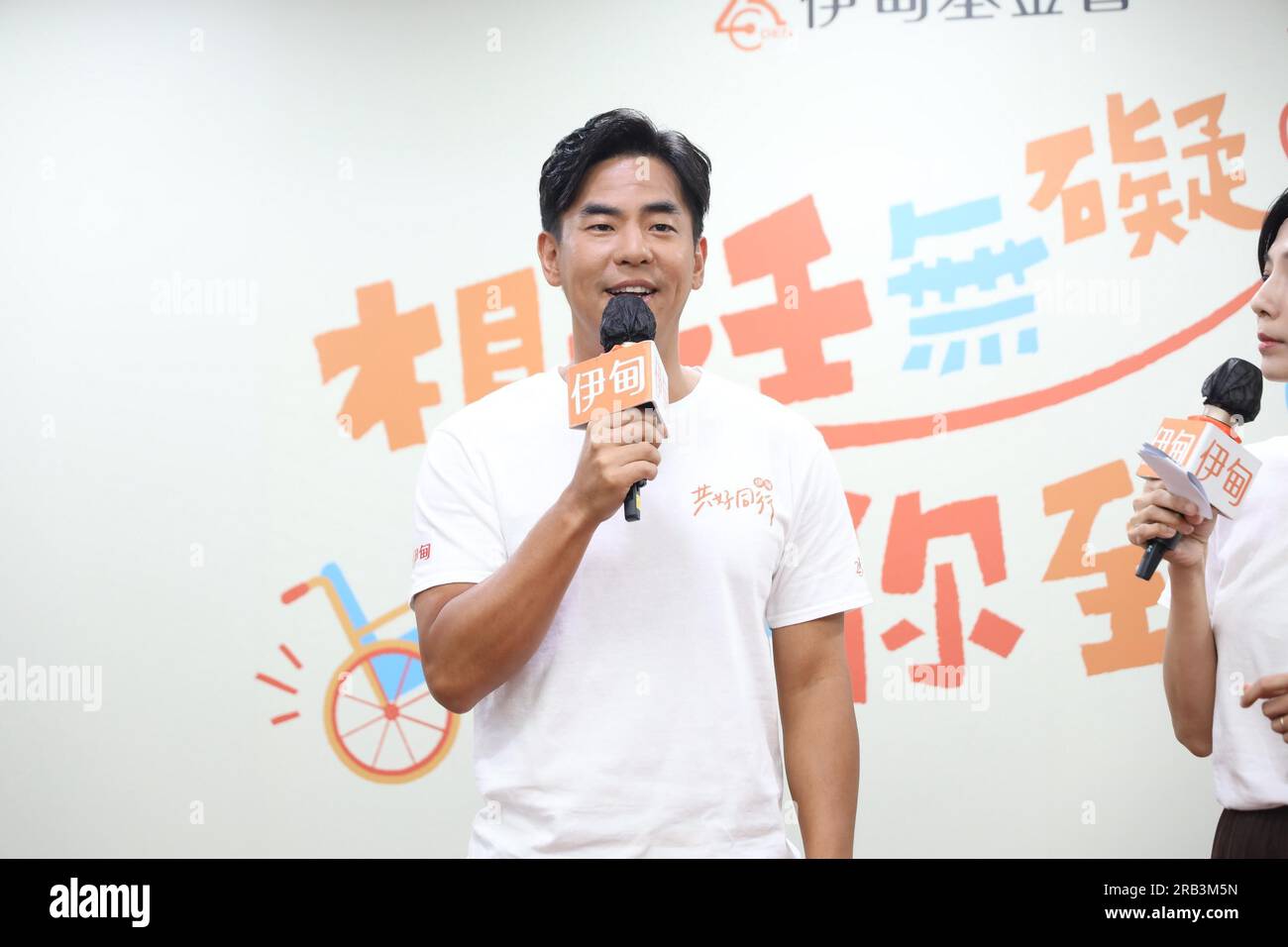 Taiwanese singer and actor Alan Ko attends a public benefit activity in ...