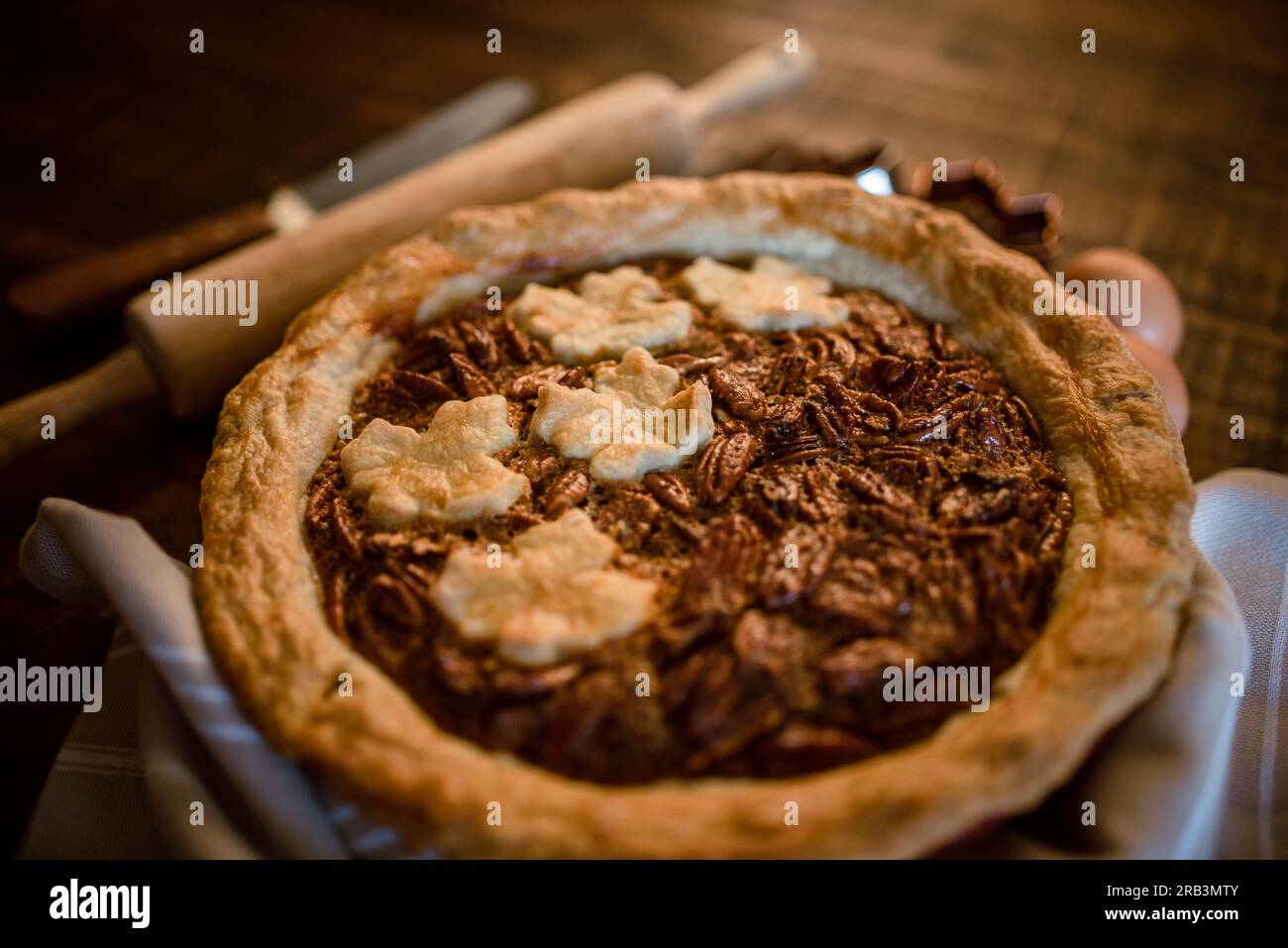 Pecan Pie in golden light Stock Photo - Alamy