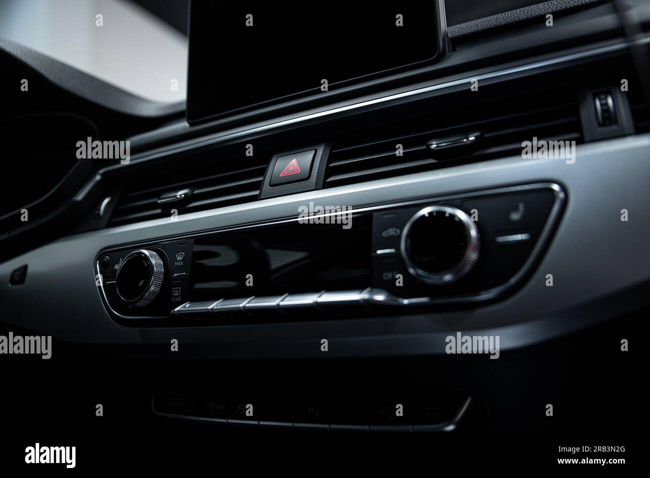 Ventilation grilles and air conditioning control panel in a modern car ...