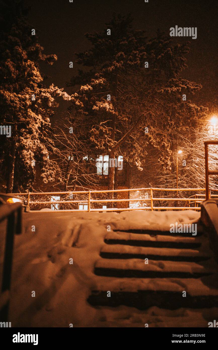 Bridge at night covered with snow Stock Photo - Alamy