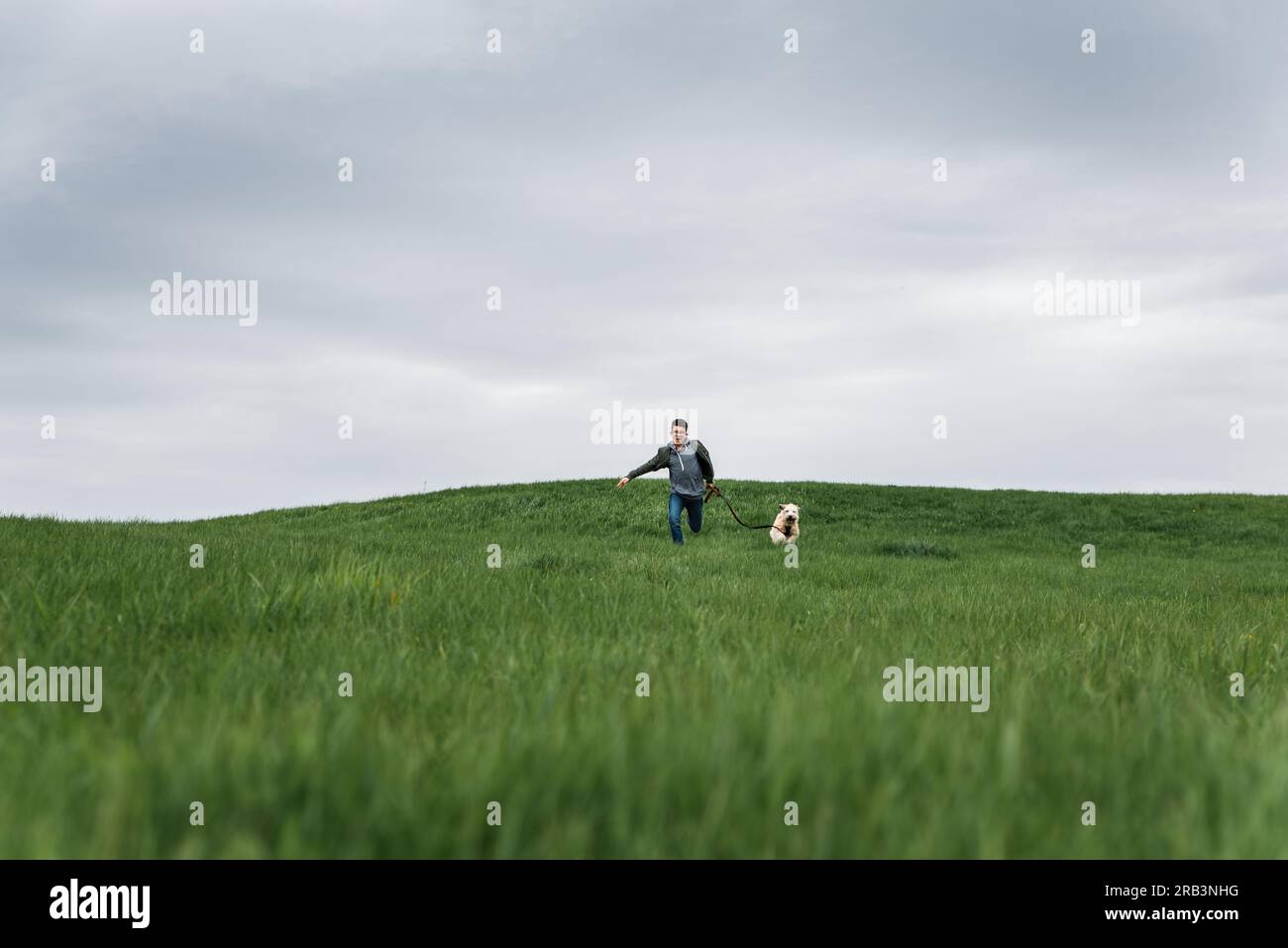 Teen boy running away hi-res stock photography and images - Alamy