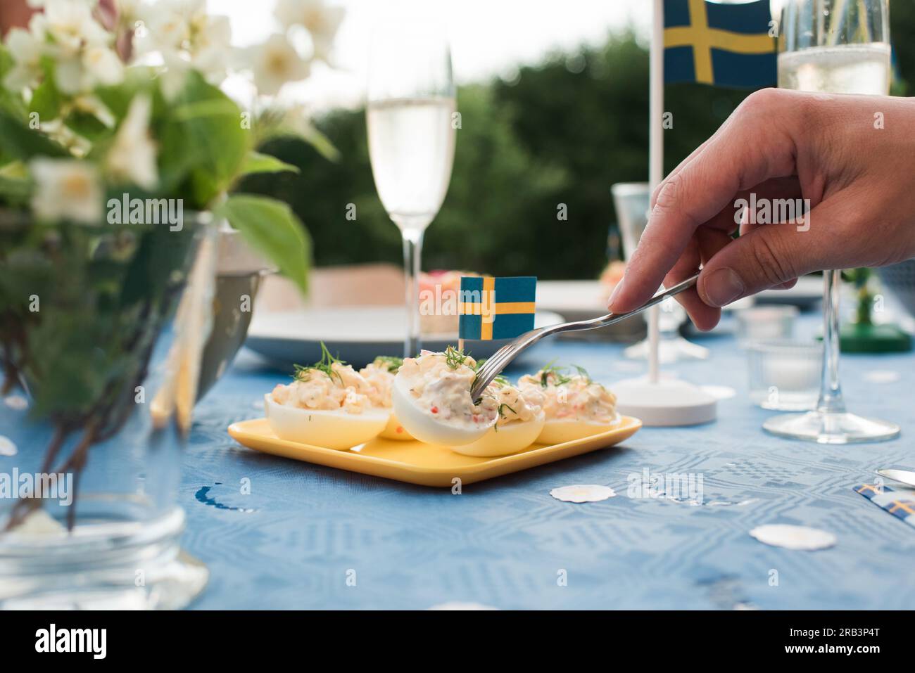 person serving traditional Swedish food at a party Stock Photo - Alamy