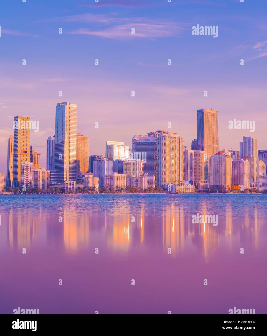 city skyline at sunset colors pink violet blue miami Florida Stock ...