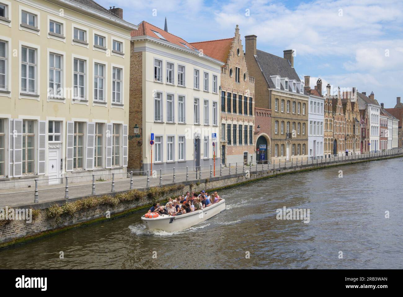Tourist sightseeing boat on canal Bruges Brugge Belgium Europe Stock ...