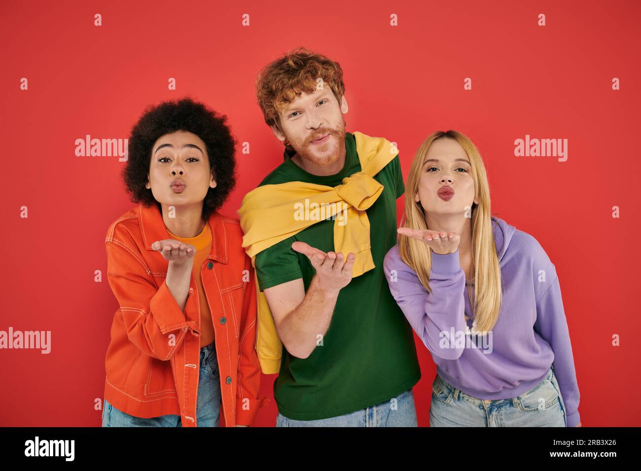 open relationship, polygamy concept, three interracial lovers blowing ...