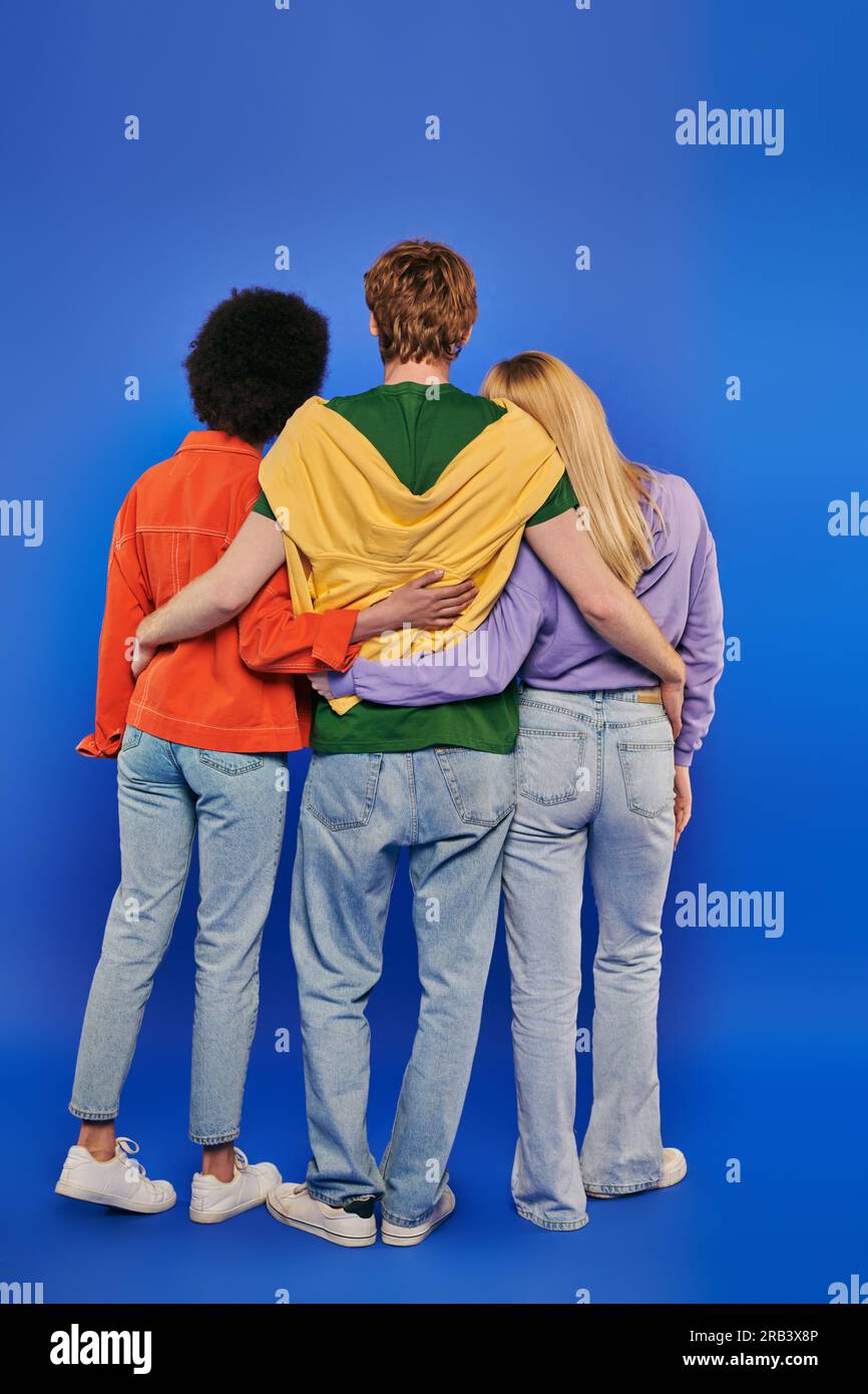Back view three women hugging hi-res stock photography and images - Alamy