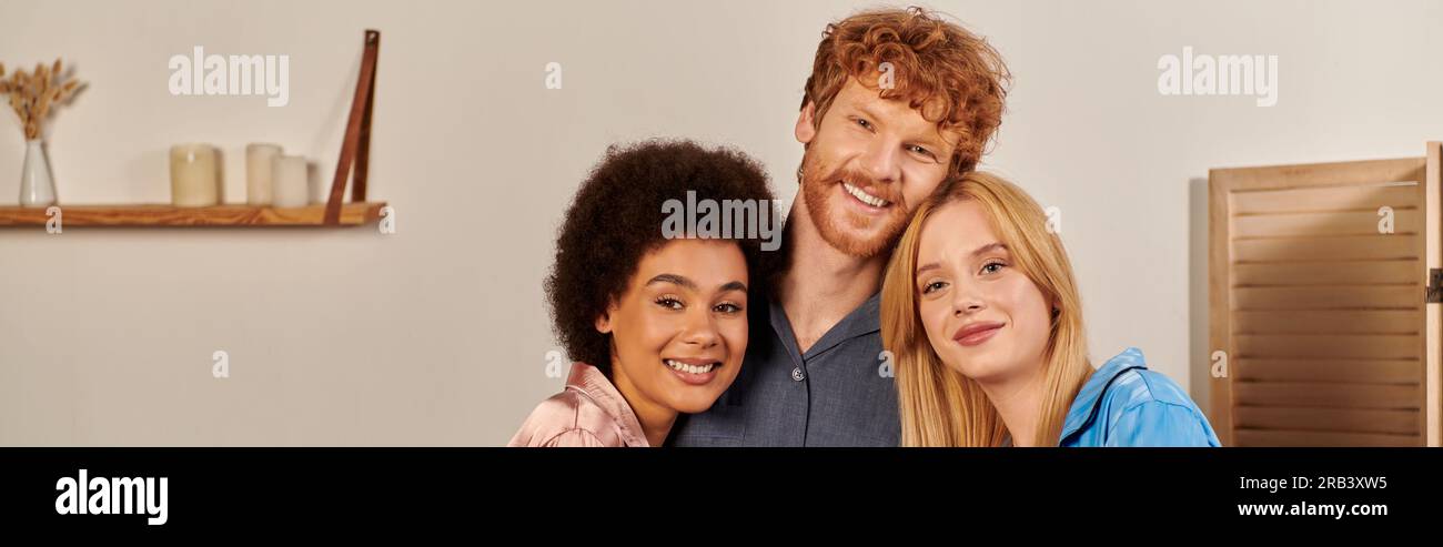 Polyamory Lovers Happy Man With Red Hair And Interracial Women At Home