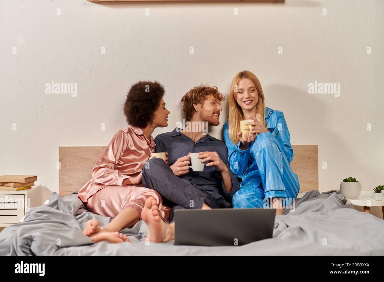 polyamory relationships, multicultural women and redhead man in pajamas ...