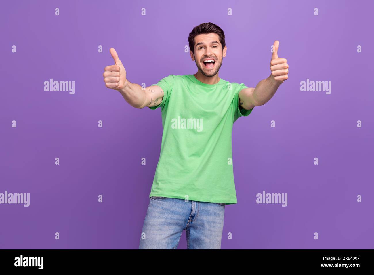 Portrait of funny positive ecstatic guy with bristle wear green t-shirt ...