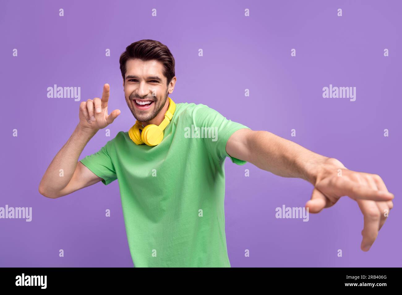 Portrait of cheerful good mood guy with bristle wear green t-shirt ...