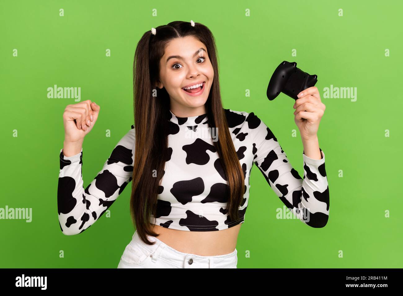 Photo of excited lucky girl dressed cowskin top smiling winning ...