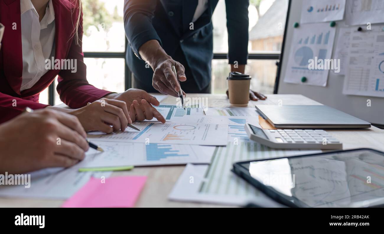 Analyst team in office analyzing financial data analysis for marketing ...