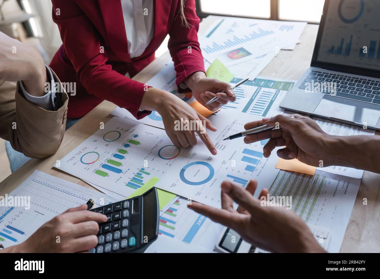 Analyst team in office analyzing financial data analysis for marketing ...